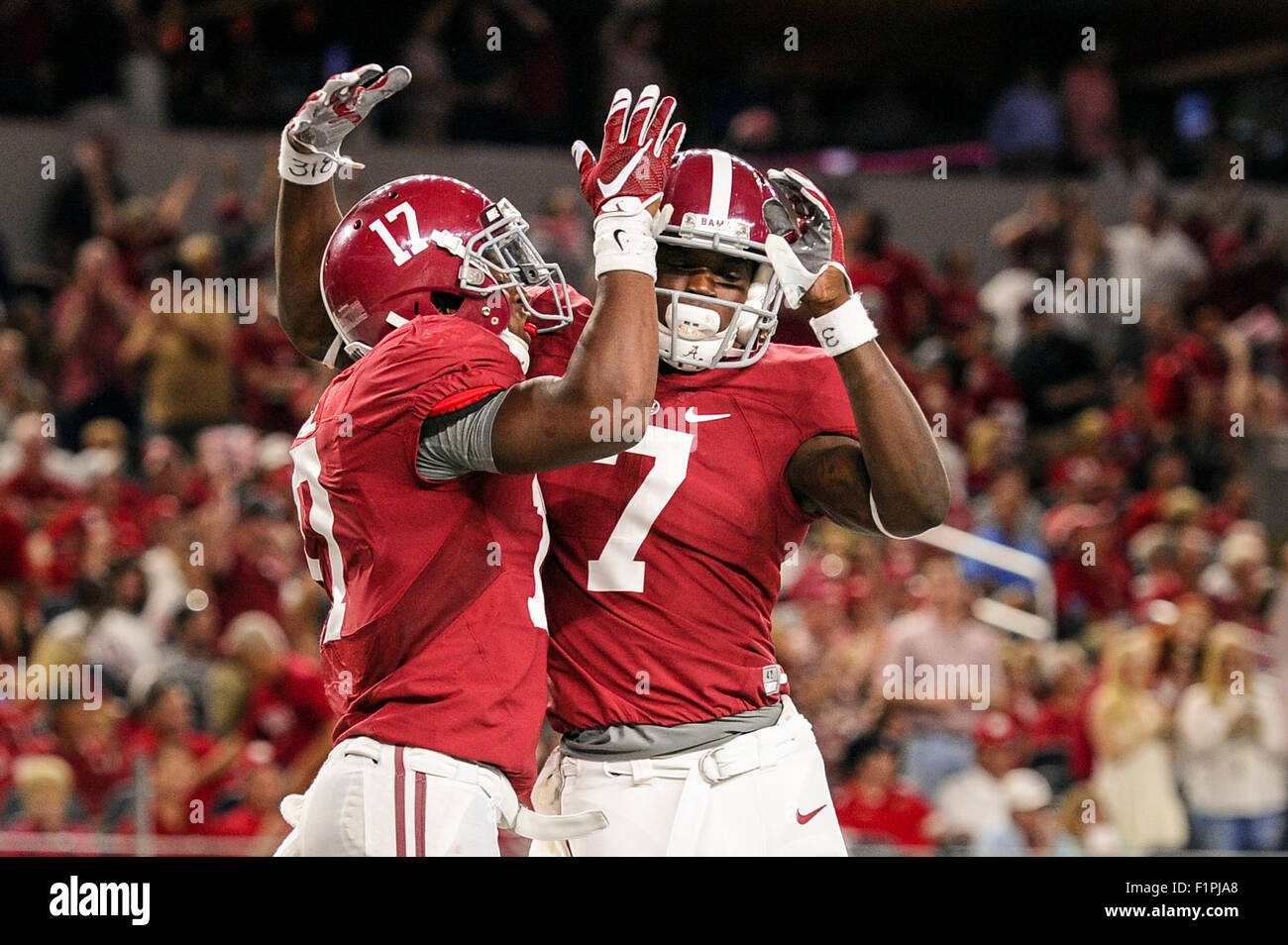 Alabama running back Kenyan Drake (17) is congratulated by receiver Cam ...