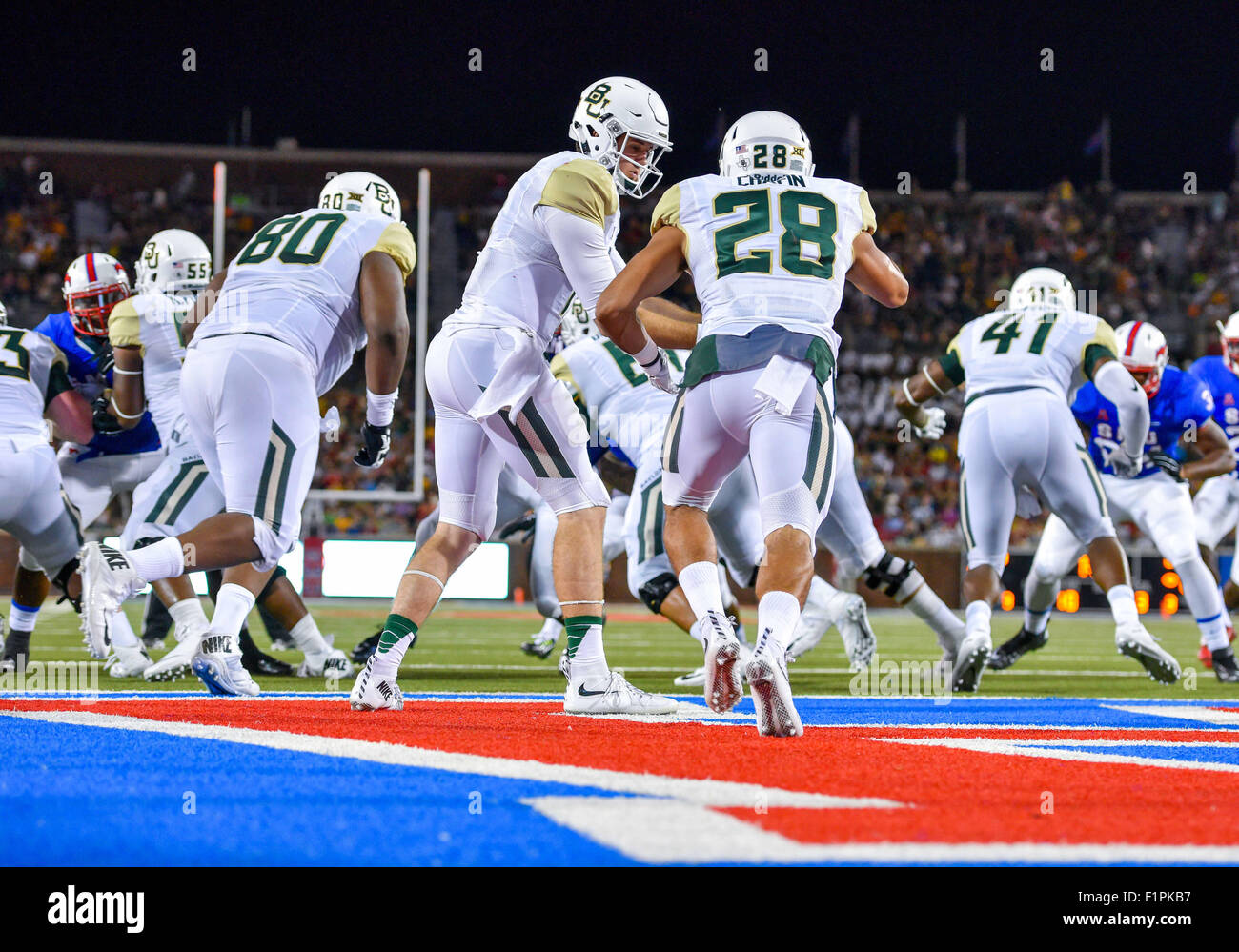 September 4th, 2015:.Baylor Bears quarterback Seth Russell (17) hands ...