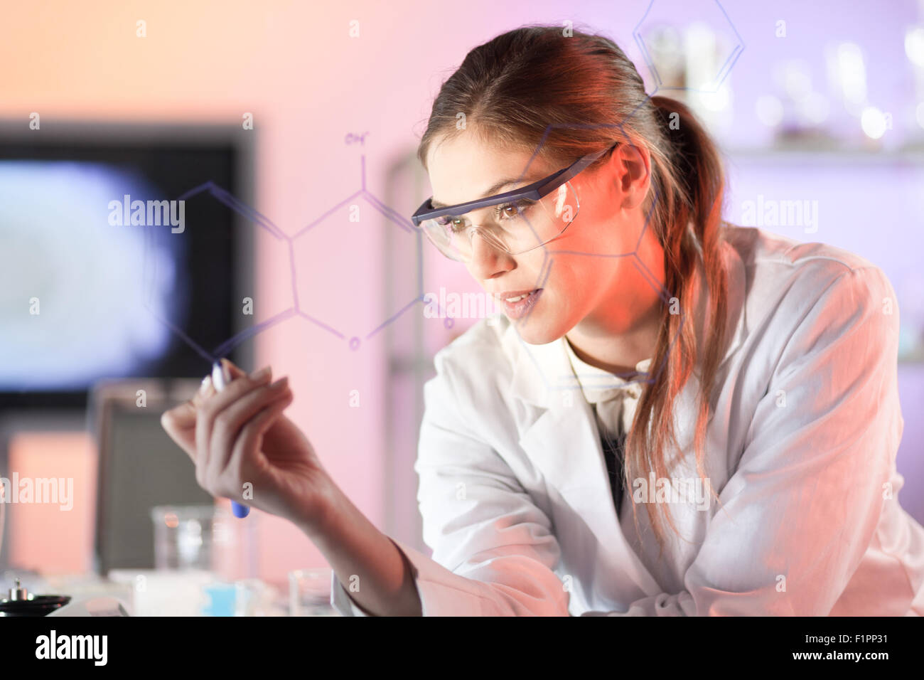 Woman in lab write formula hi-res stock photography and images - Alamy