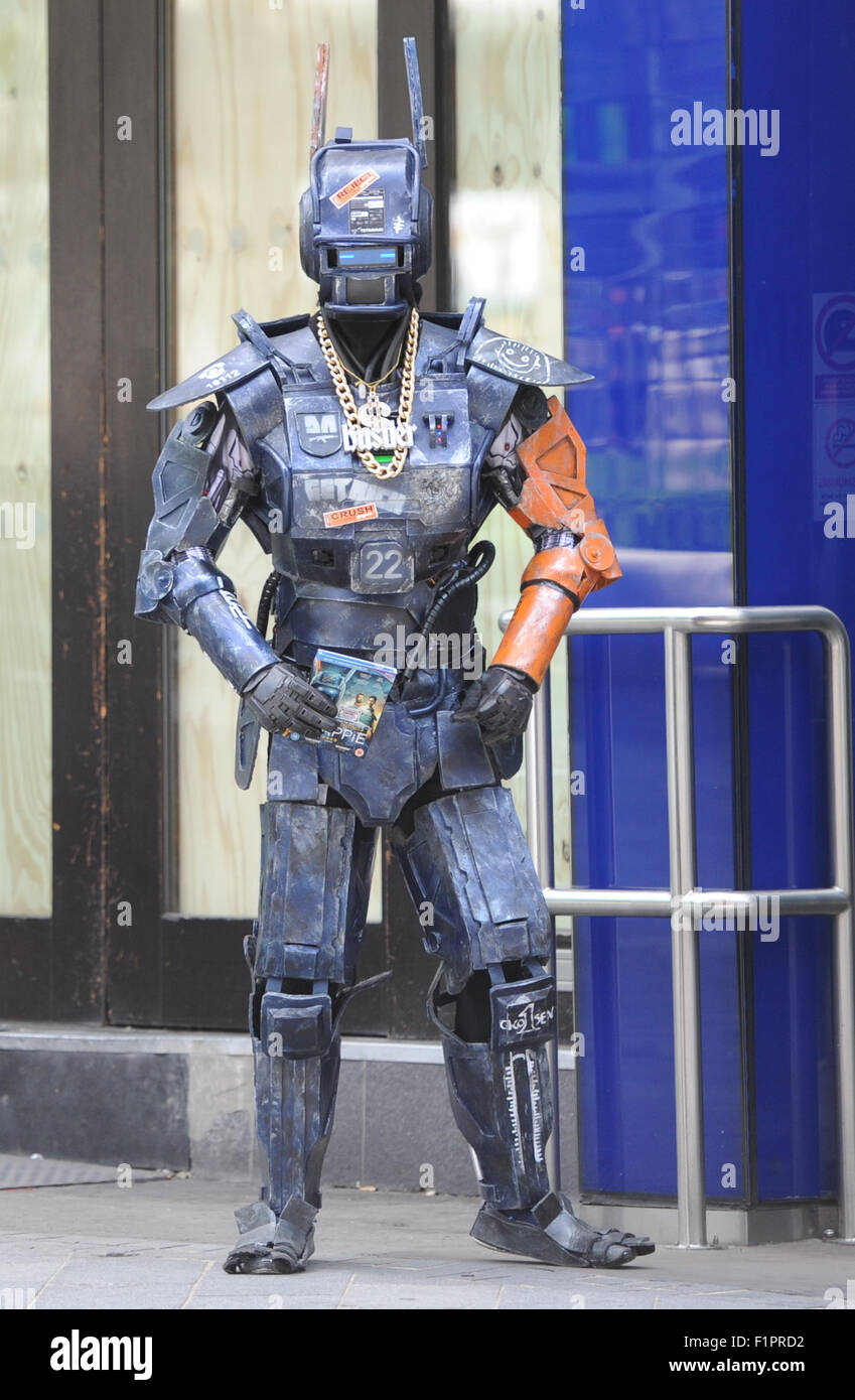 A person dressed as Chappie, the police droid from the movie of the ...