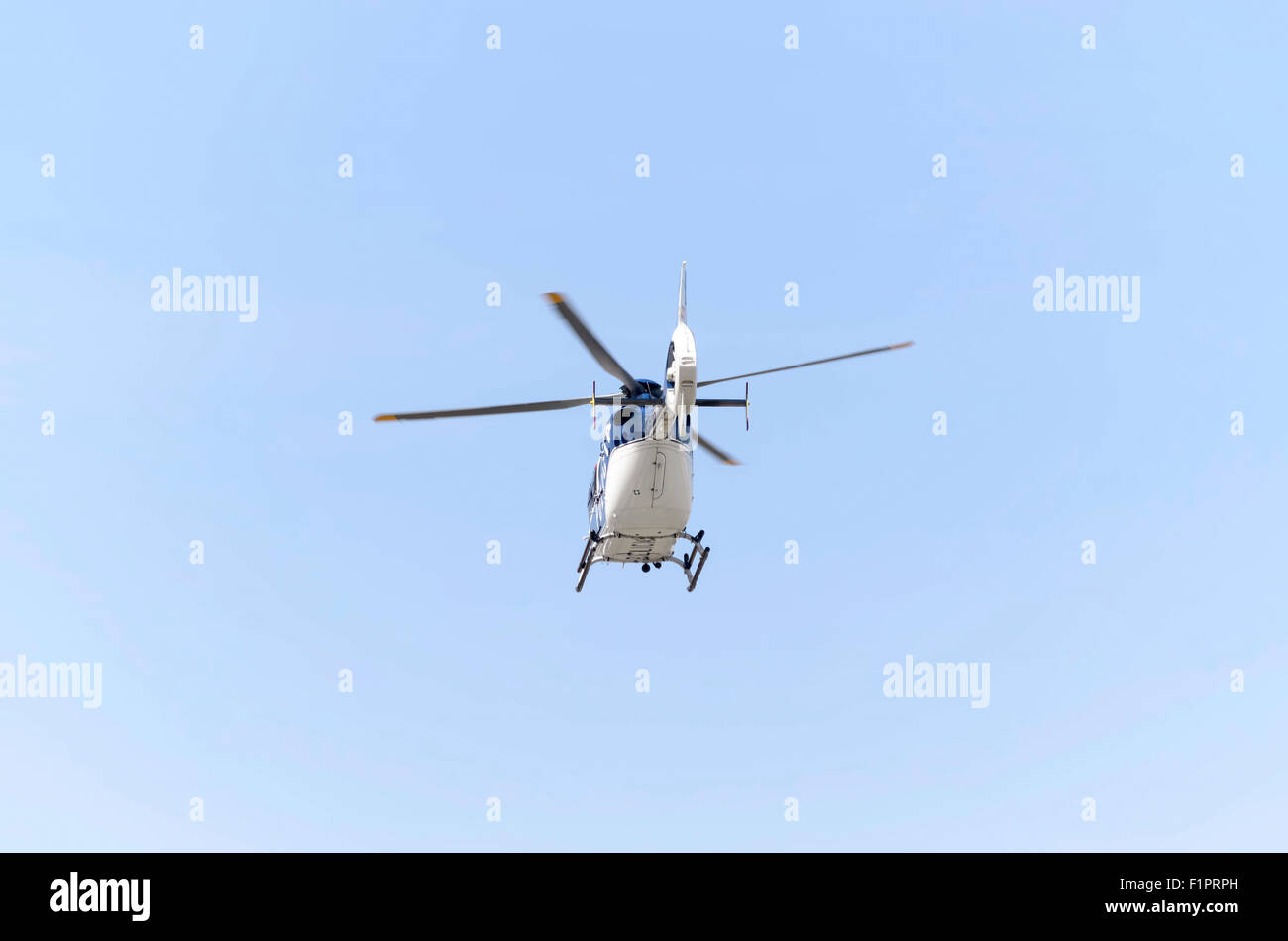 Rear view. Helicopter, of spanish police, is taking off with ...