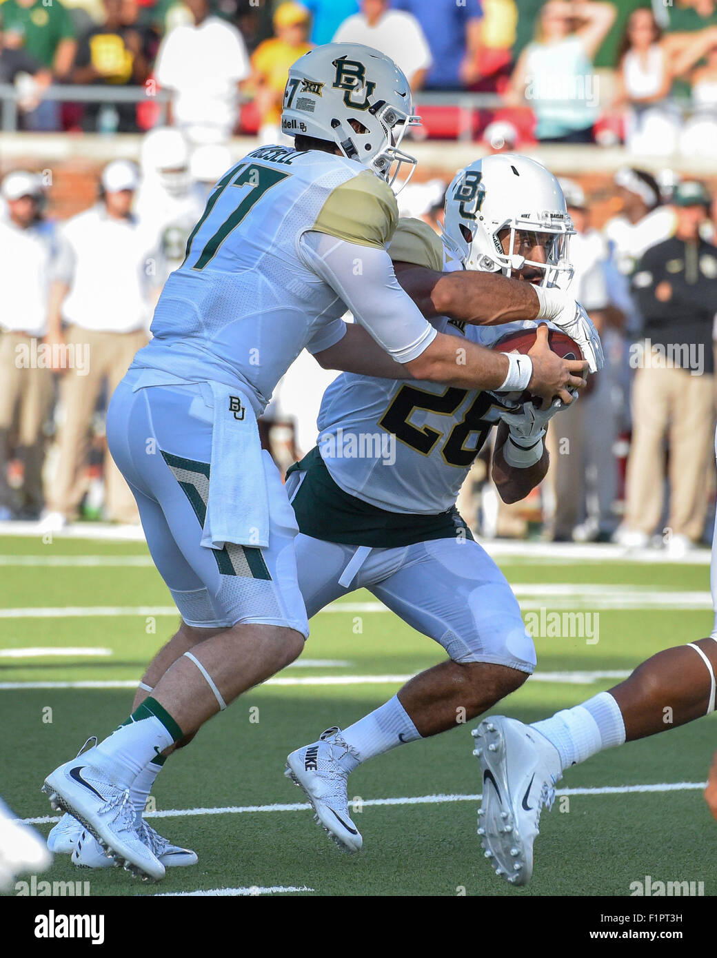 September 4th, 2015:.Baylor Bears quarterback Seth Russell (17) hands ...