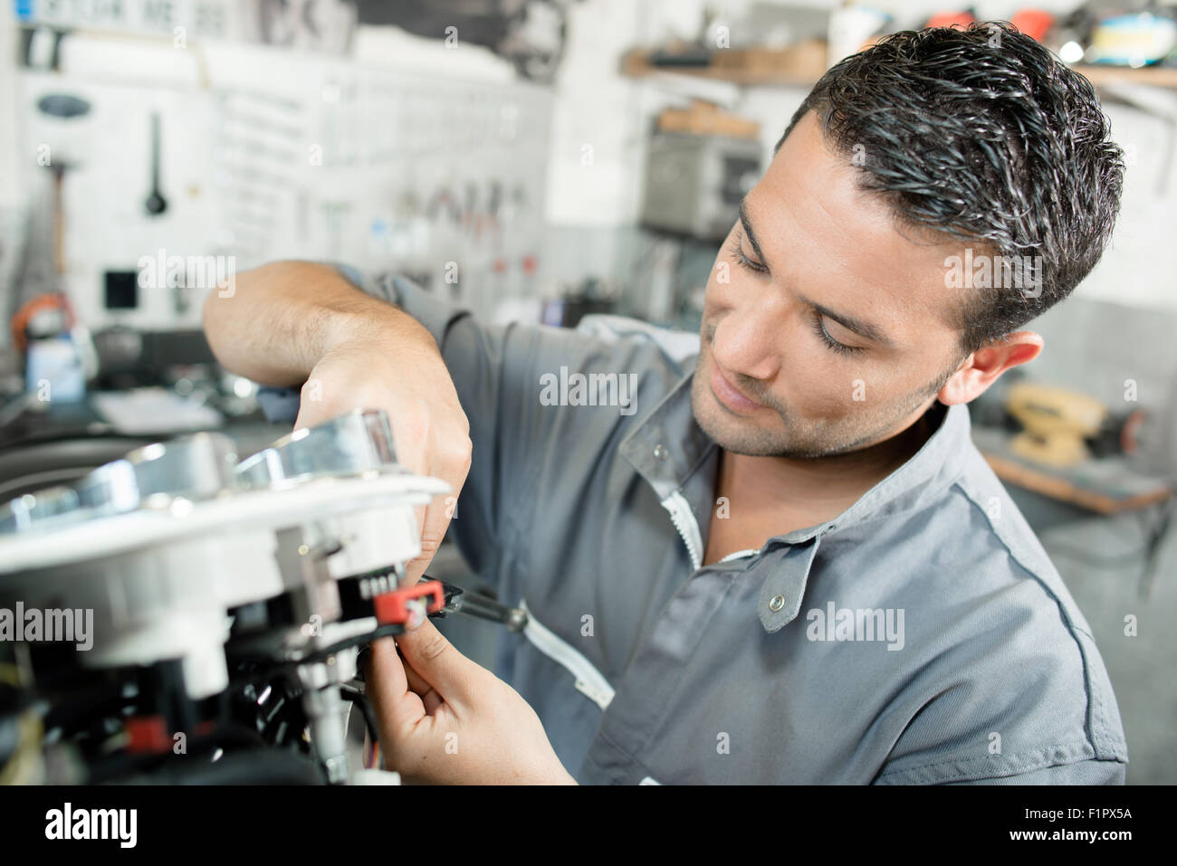 Man with machine Stock Photo - Alamy