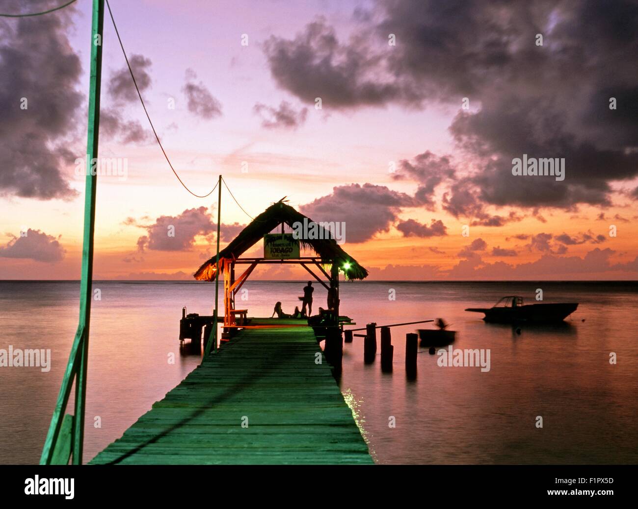 The jetty at Pigeon Point at sunset, Tobago, Trinidad and Tobago ...