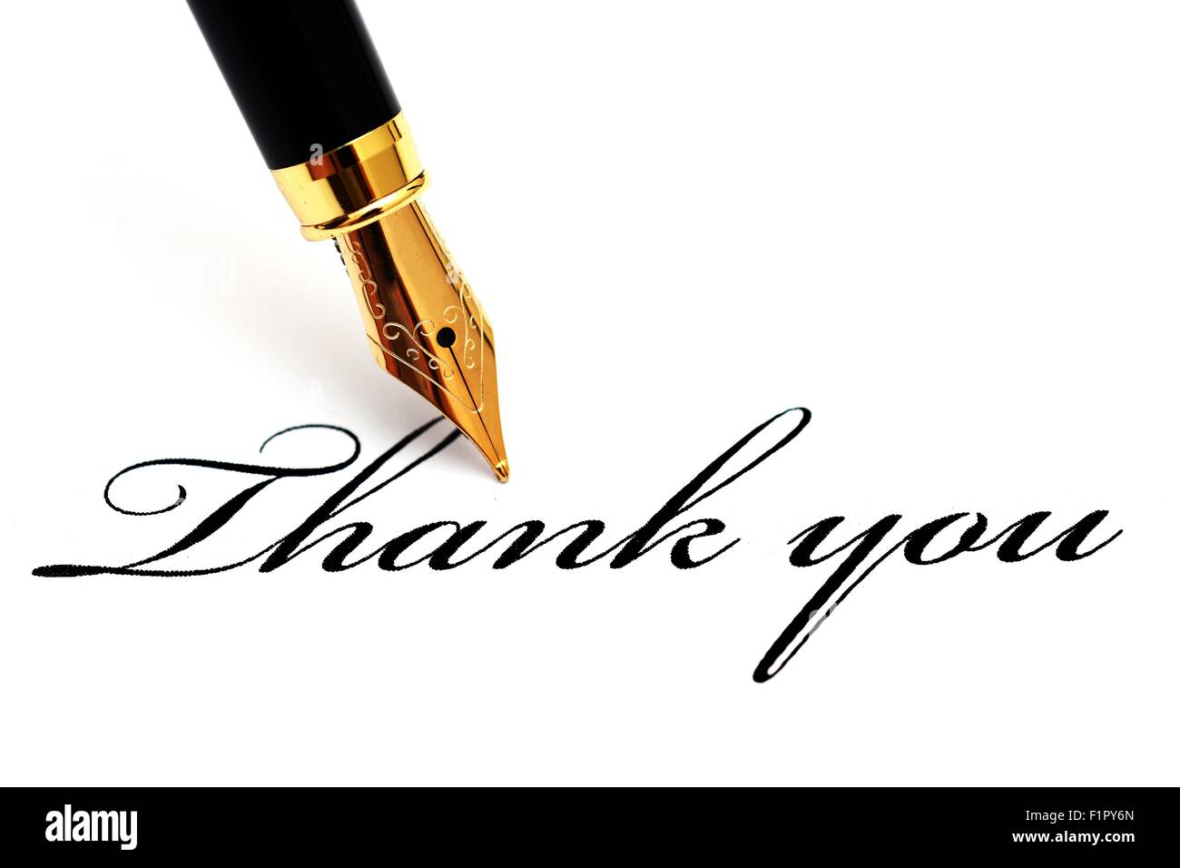 Thank you text and fountain pen Stock Photo - Alamy