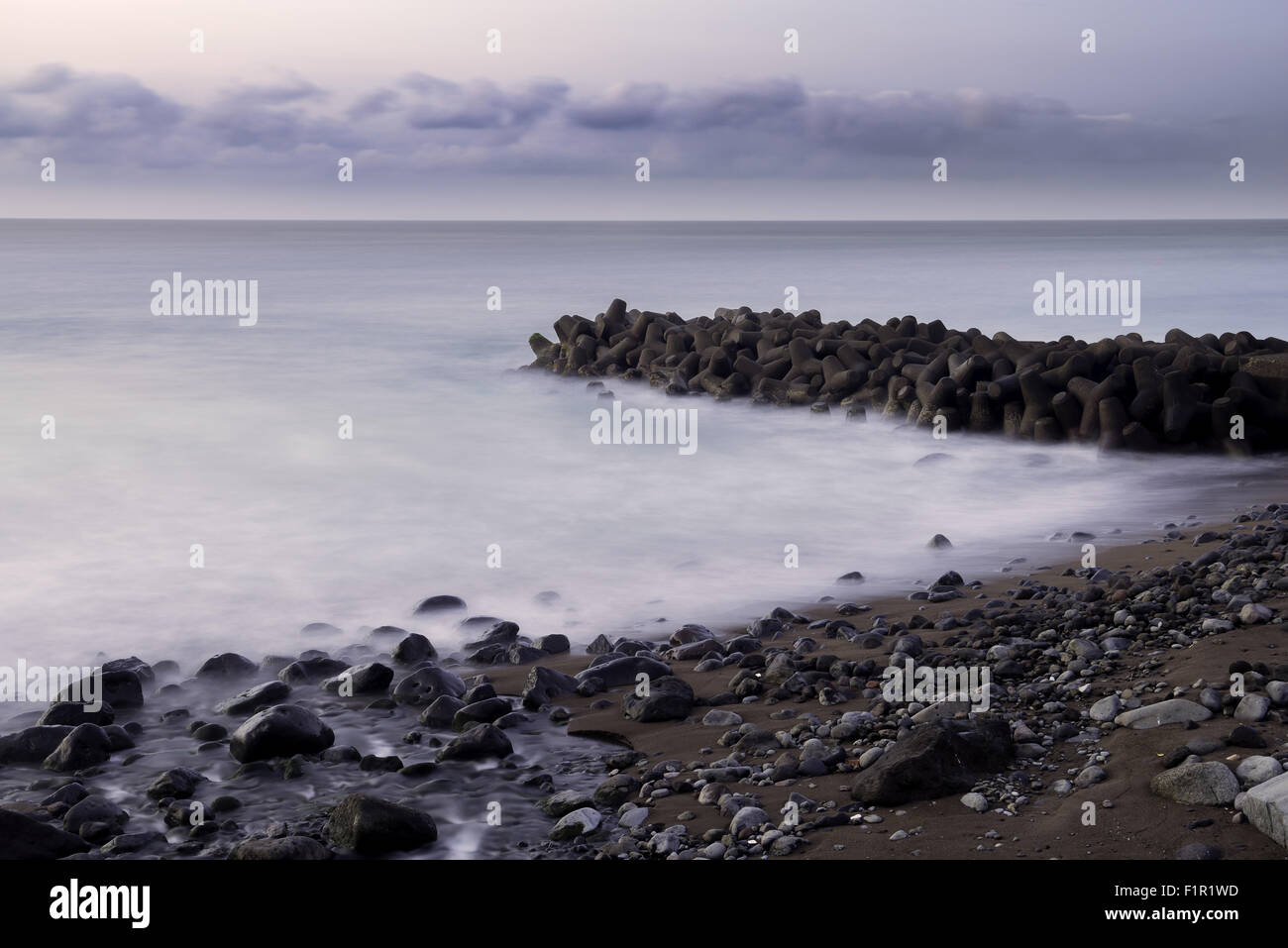 Wave breakers and sea at sunrise in Atagawa, Shizuoka Prefecture, Japan ...