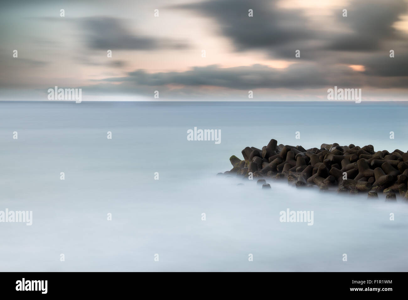 Wave breakers and sea at sunrise in Atagawa, Shizuoka Prefecture, Japan ...