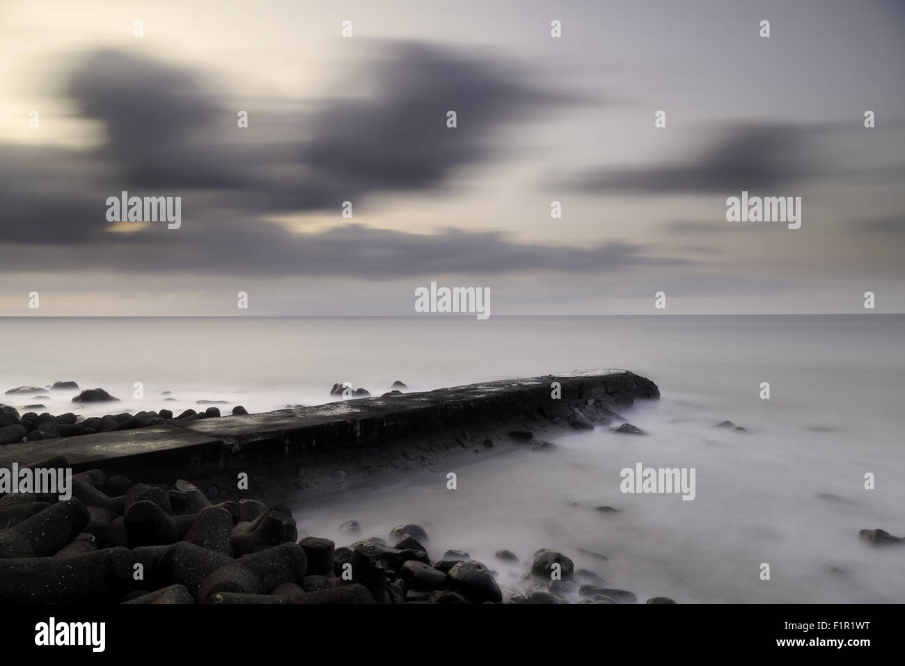 Wave breakers and sea at sunrise in Atagawa, Shizuoka Prefecture, Japan ...