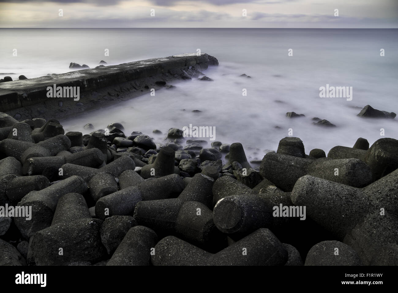 Wave breakers and sea at sunrise in Atagawa, Shizuoka Prefecture, Japan ...