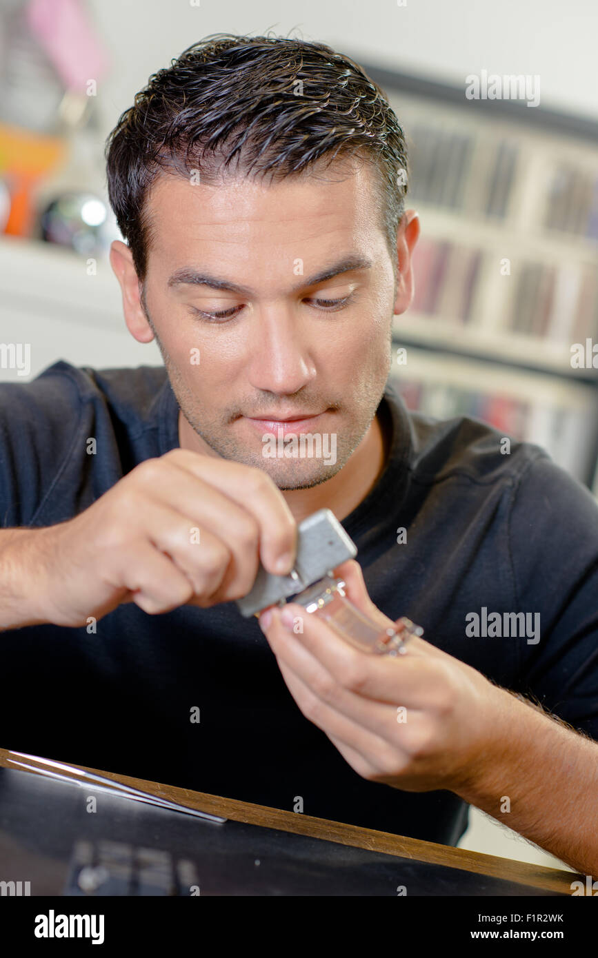 Broken clock repair hi-res stock photography and images - Alamy