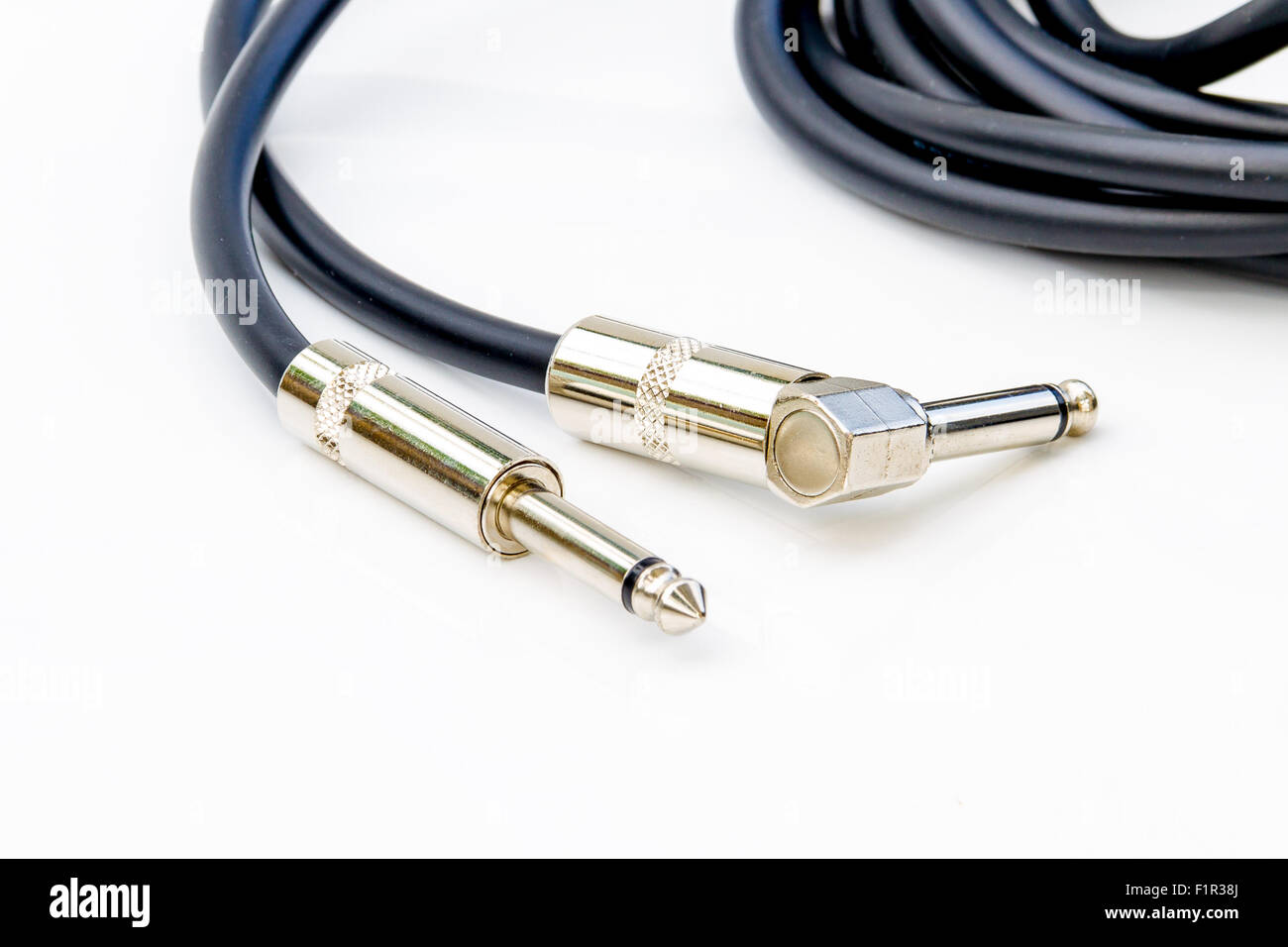 guitar cable on an isolated background Stock Photo - Alamy