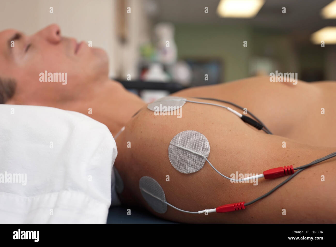 Electro stimulation man High Resolution Stock Photography and Images - Alamy