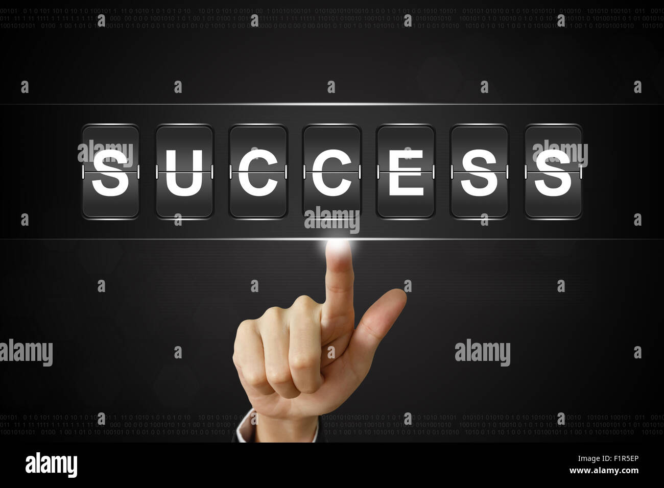 business hand pushing success on Flipboard Display Stock Photo - Alamy
