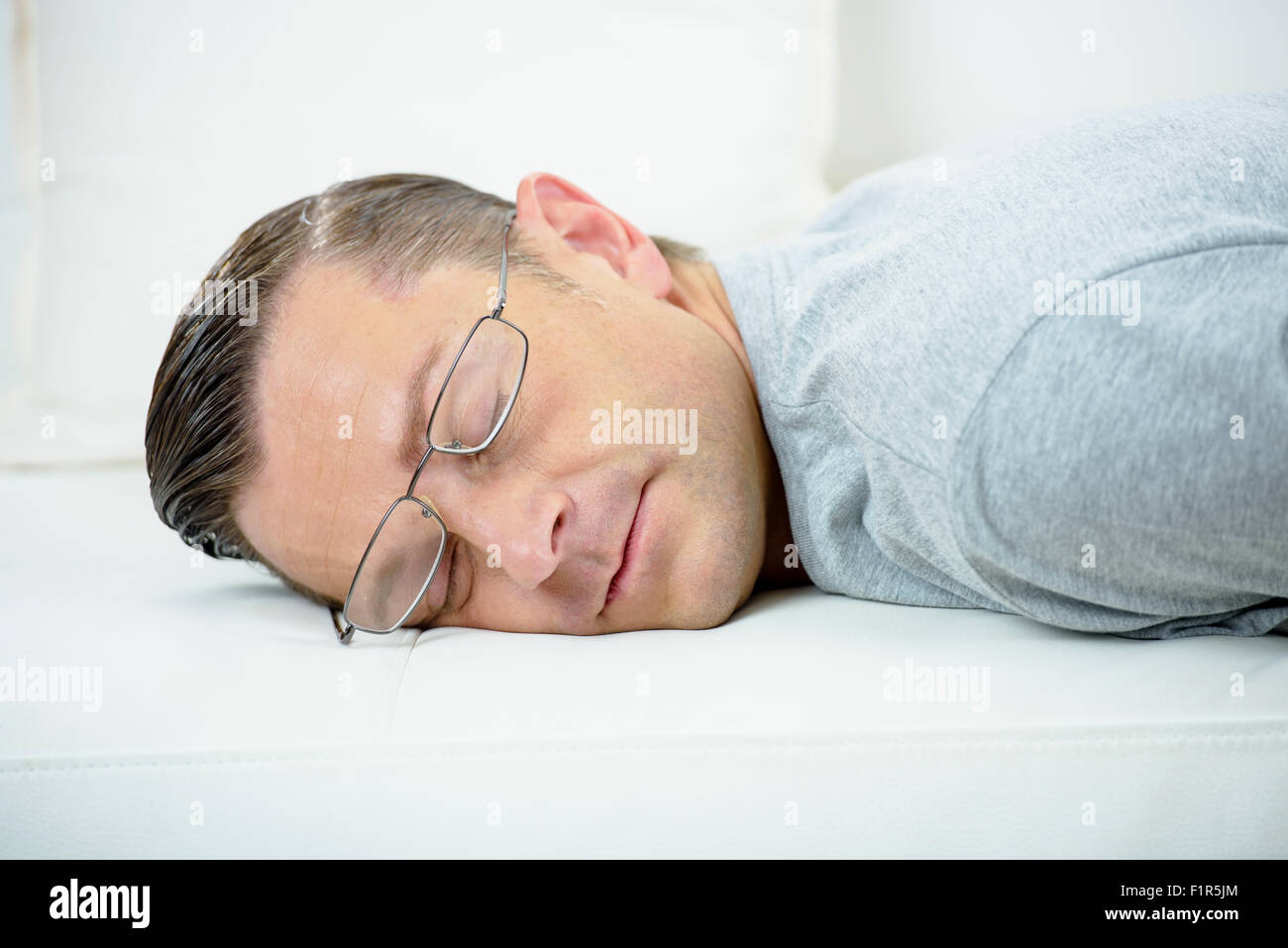 Man taking little nap hi-res stock photography and images - Alamy