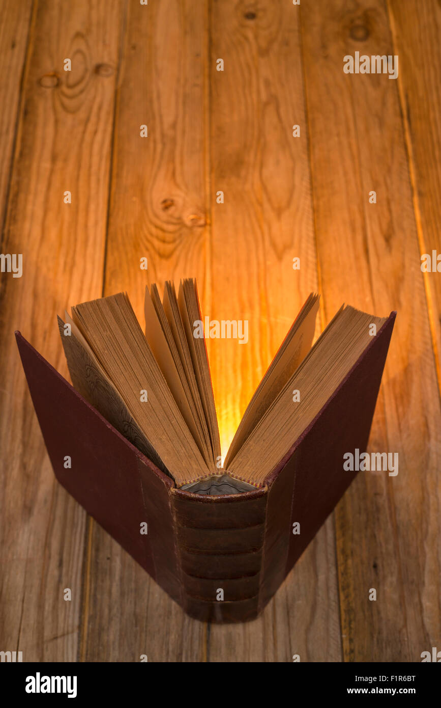 Magic open book. Education concept Stock Photo - Alamy