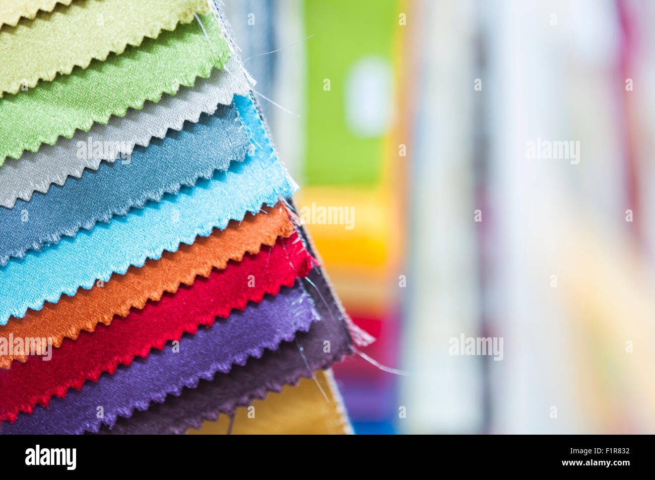 Close-up detail of multicolor fabric textile samples with copy space ...