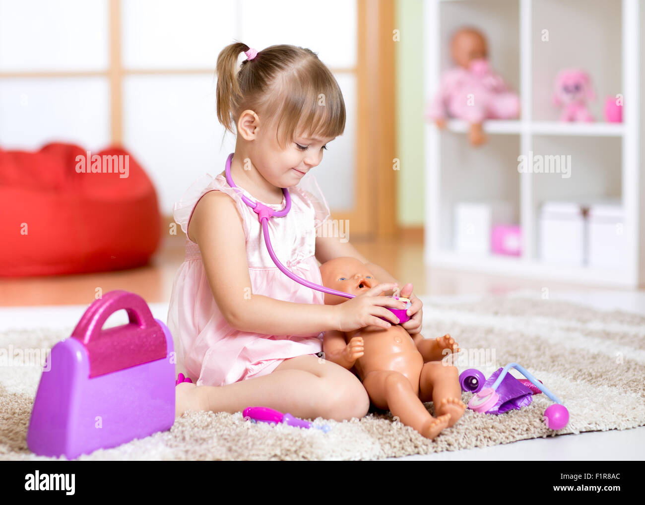 Child playing doctor stethoscope hi-res stock photography and images ...
