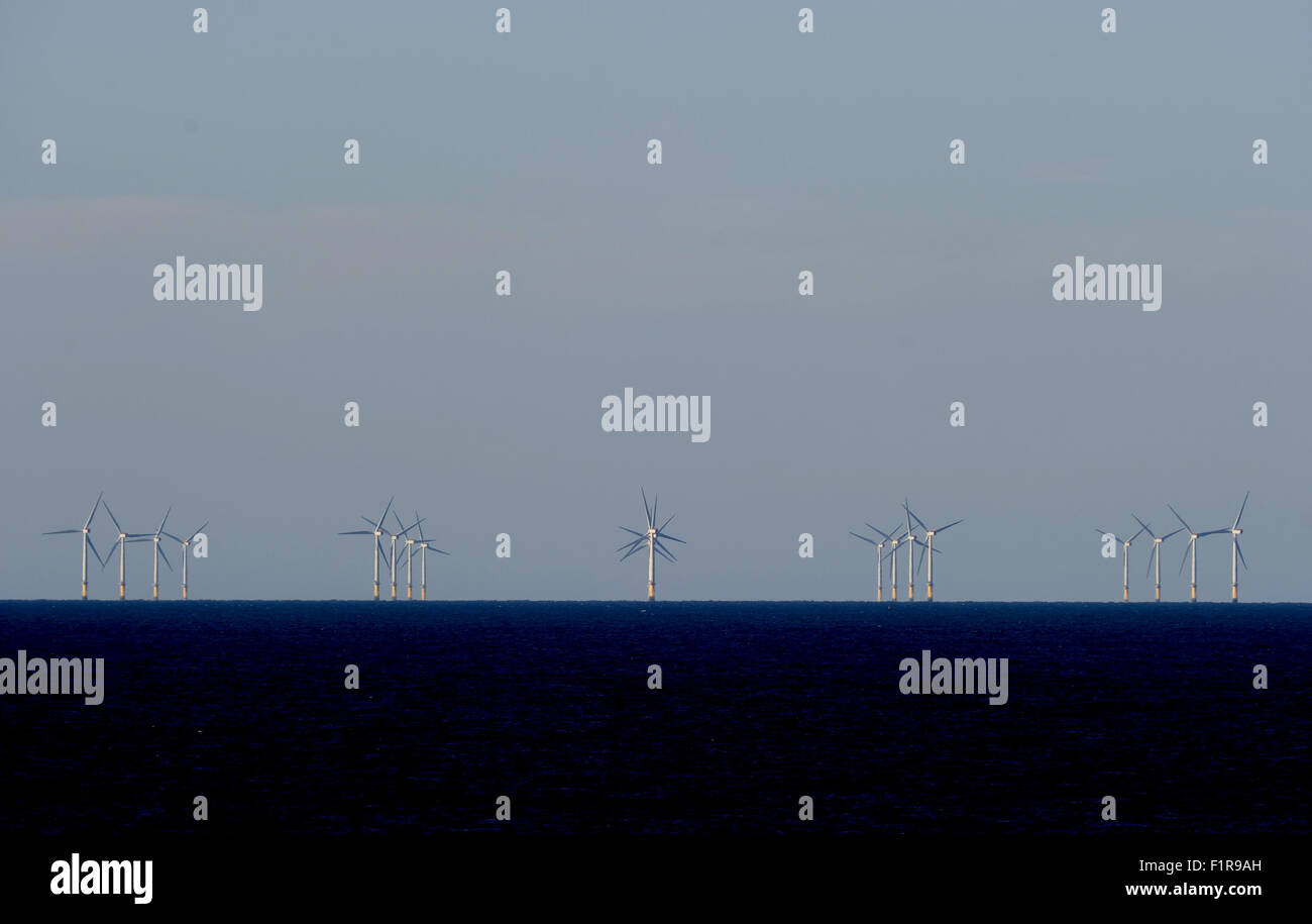 The wind turbines can be seen from the beach. Weybourne beach and ...