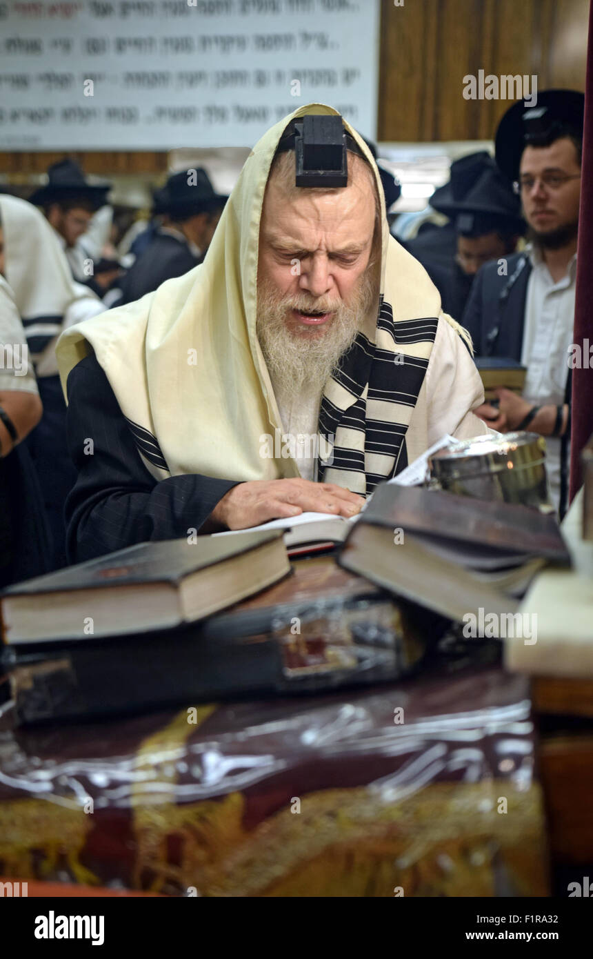 A very religious Jewish man leading the congregation in morning ...