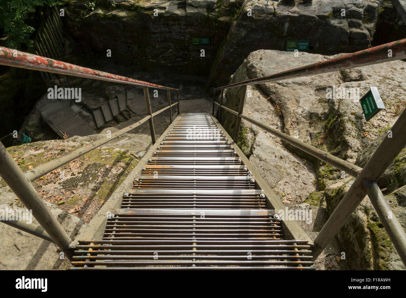 metal bridge over the chasm in the rock city in Bastein, forests and ...