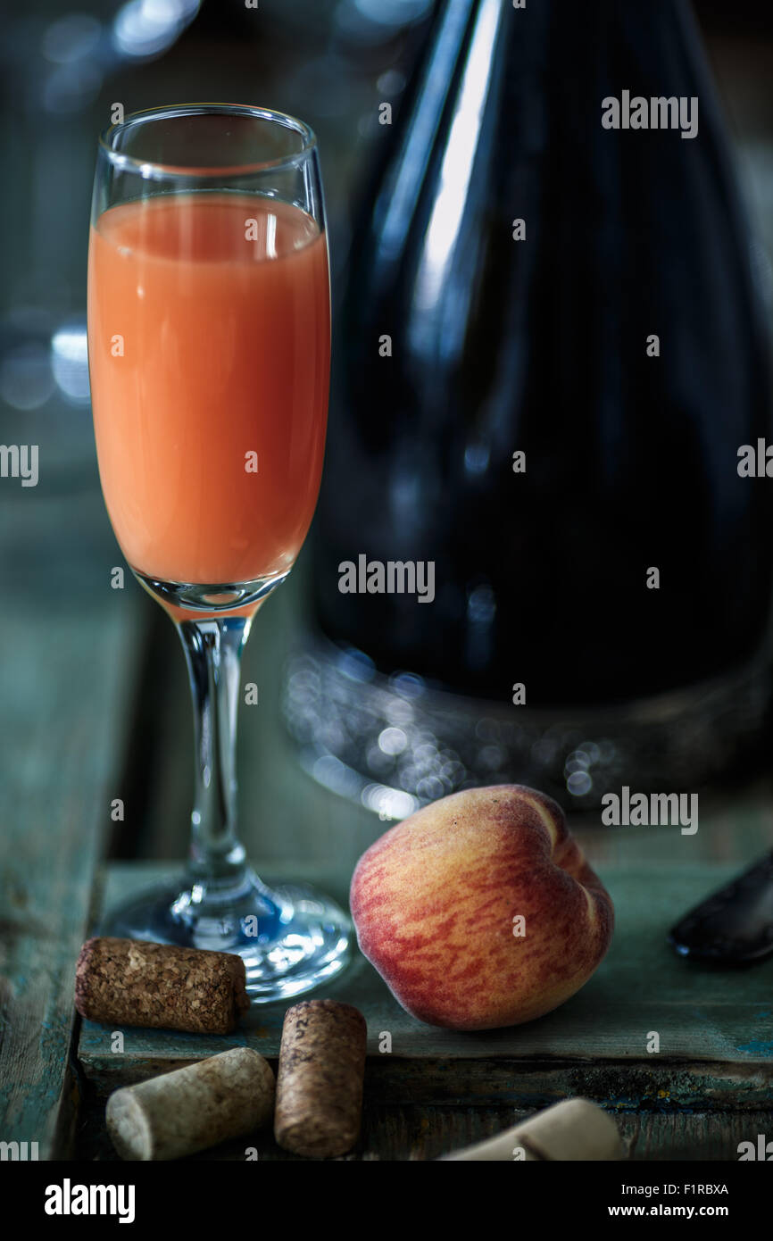 Famous Italian Bellini alcoholic cocktail made from pink peach puree ...