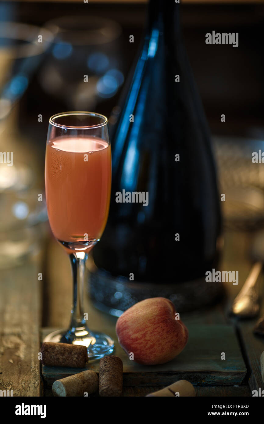 Famous Italian Bellini alcoholic cocktail made from pink peach puree ...