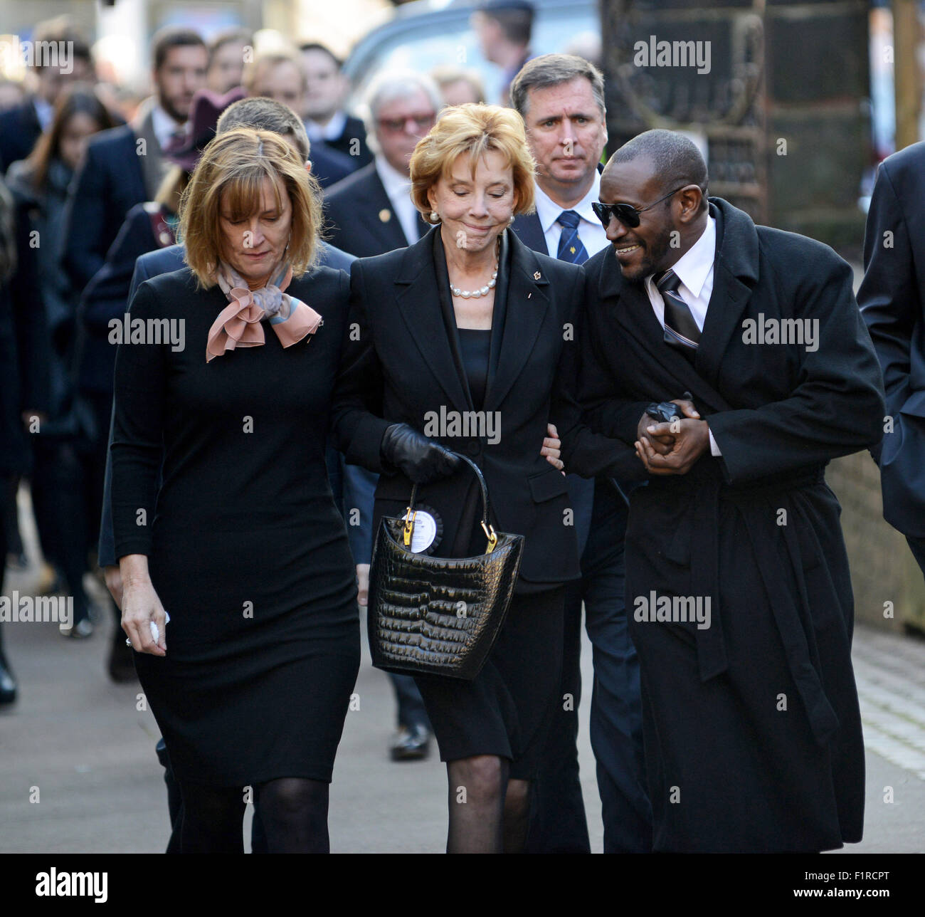 Patti Bloom (centre) at the Sir Jack Hayward funeral Stock Photo - Alamy