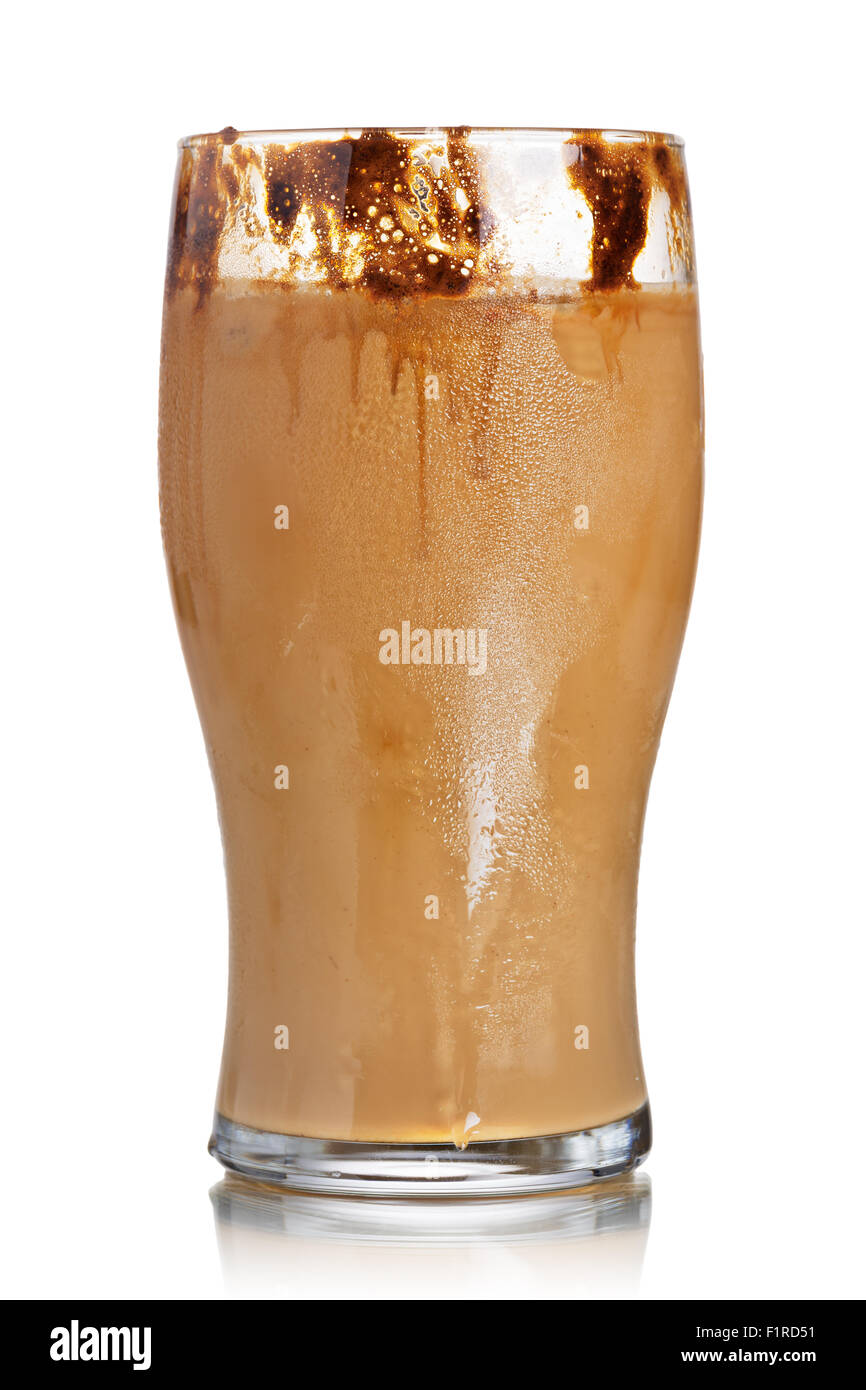Milk coffee cocktail from frozen coffee cubes in highball glass. Iced ...