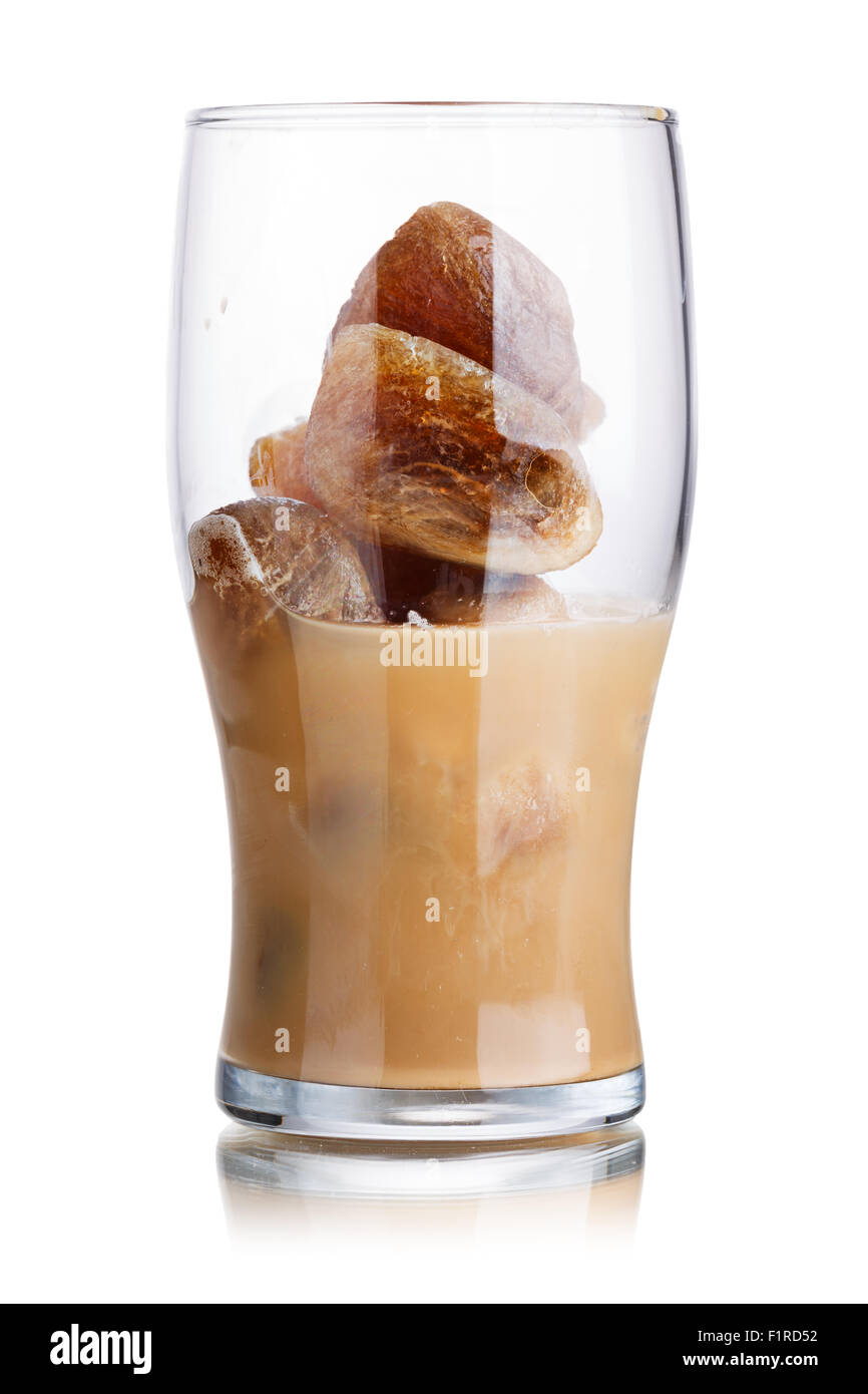 Milk coffee cocktail from frozen coffee cubes in highball glass. Iced ...