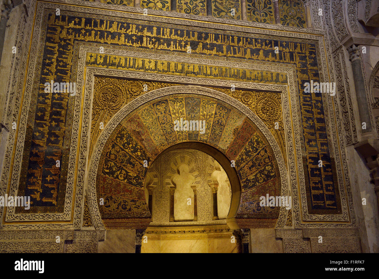 Mihrab with gold mosaic design and calligraphy at the Prayer Hall of ...