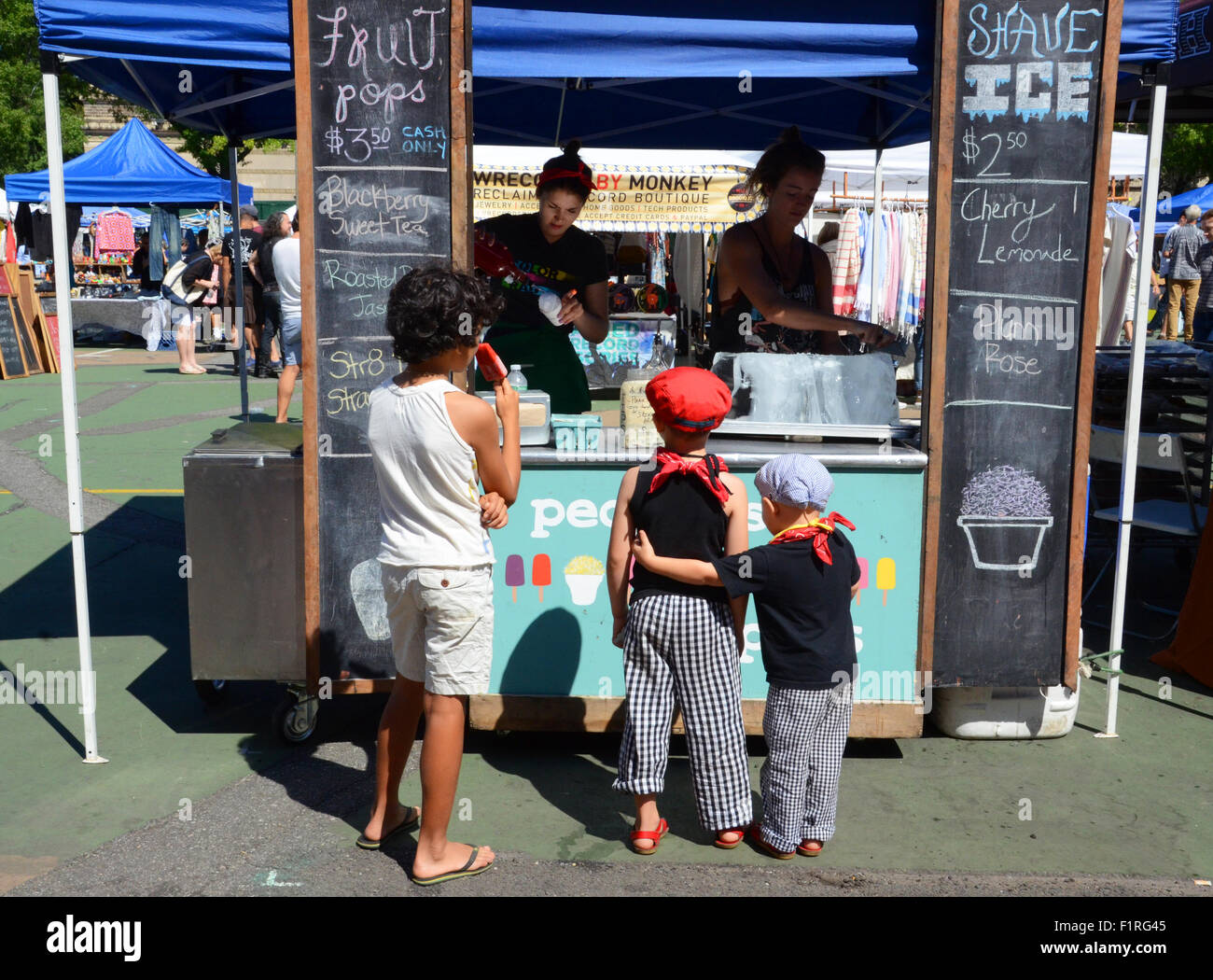 people's pops shaved ice stall brooklyn flea children Stock Photo - Alamy