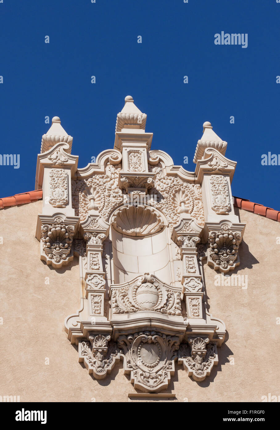 The peak of a southwestern style building showing elaborate decoration ...