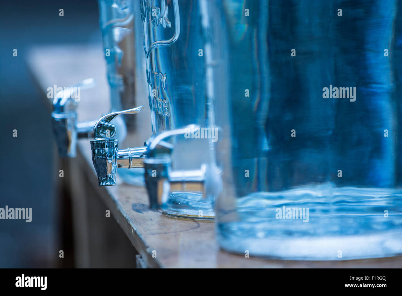 Three large containers of water Stock Photo - Alamy