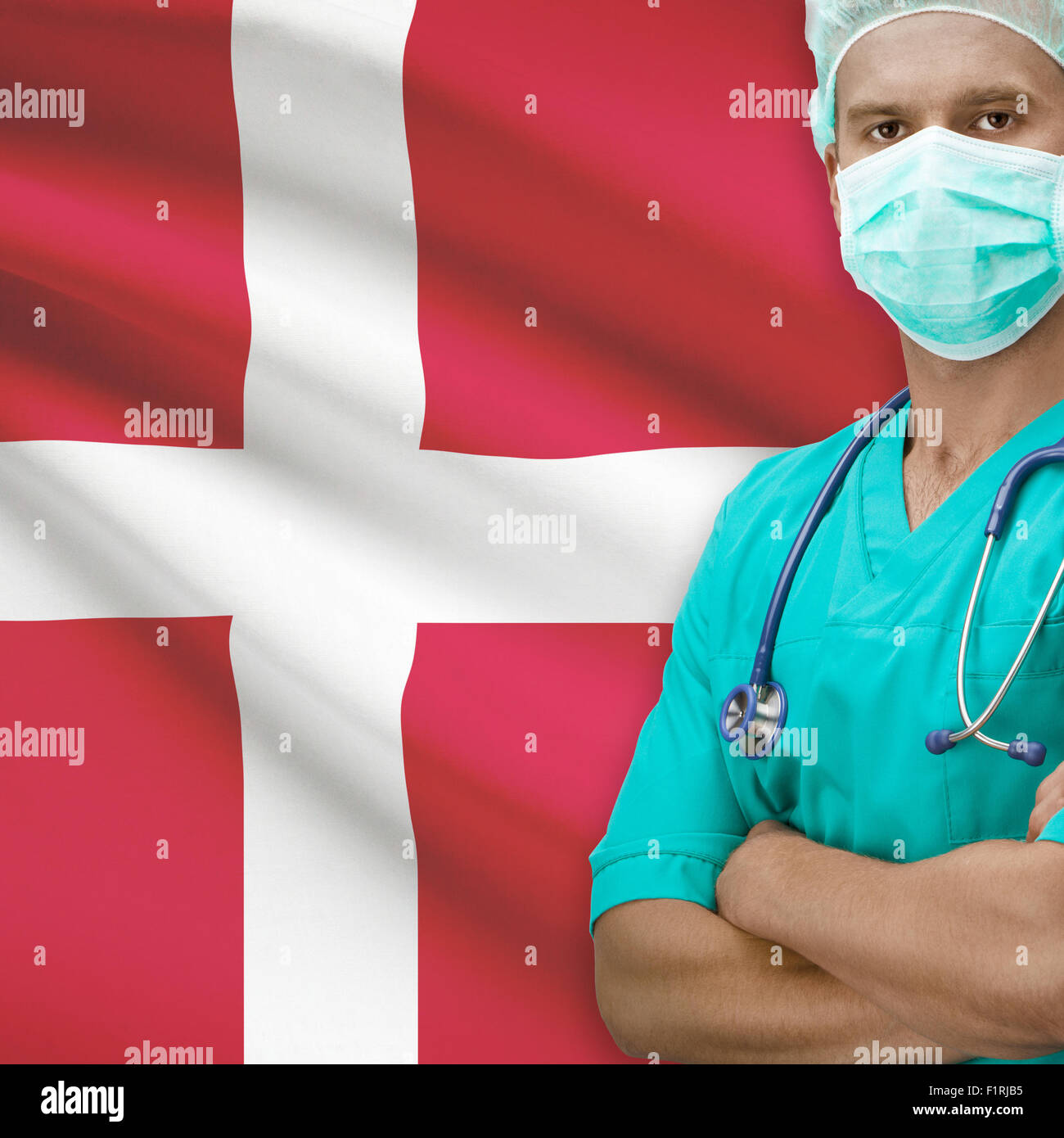 Surgeon with flag on background - Denmark Stock Photo - Alamy