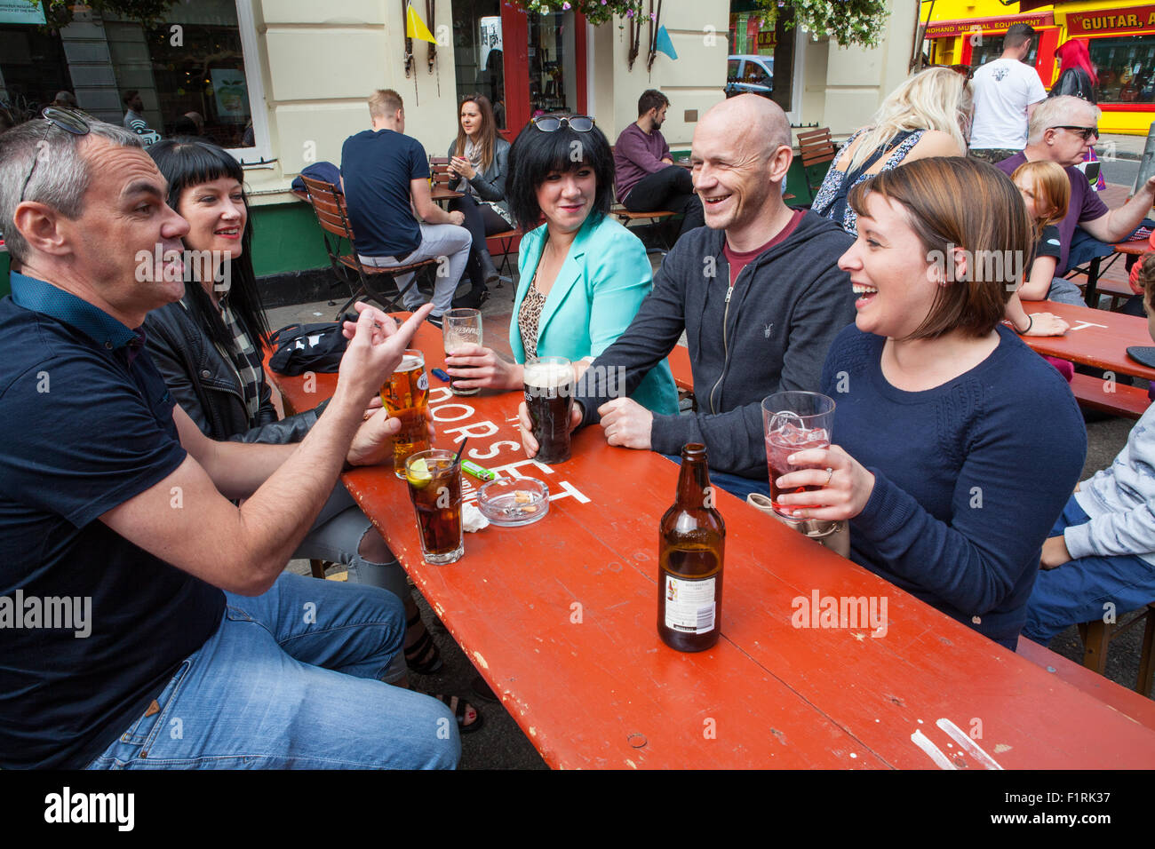 A group of friends enjoying a drink at the Dorset Arms pub in Brighton ...