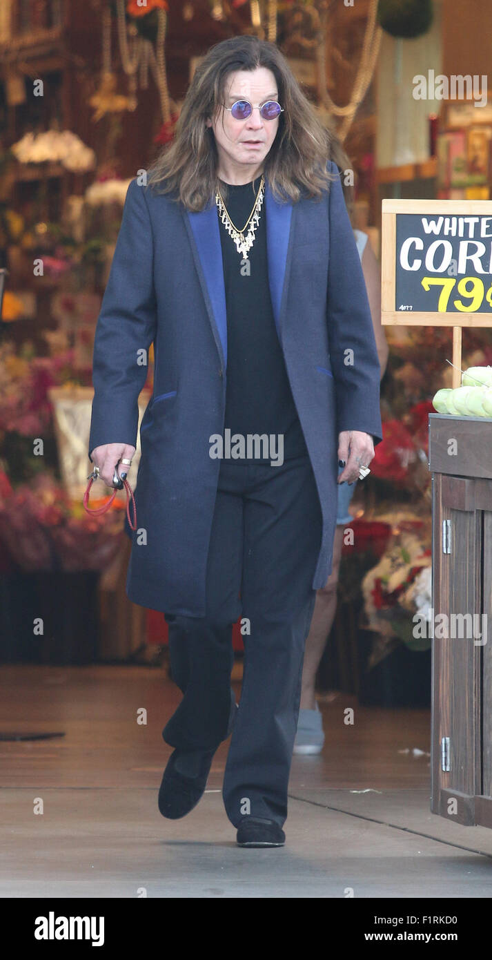 Ozzy Osbourne shopping at Bristol Farms in Beverly Hills wearing a long ...