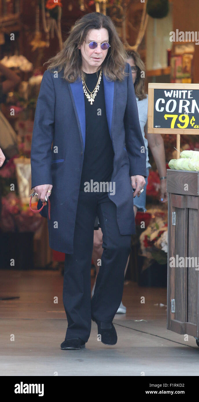 Ozzy Osbourne shopping at Bristol Farms in Beverly Hills wearing a long ...