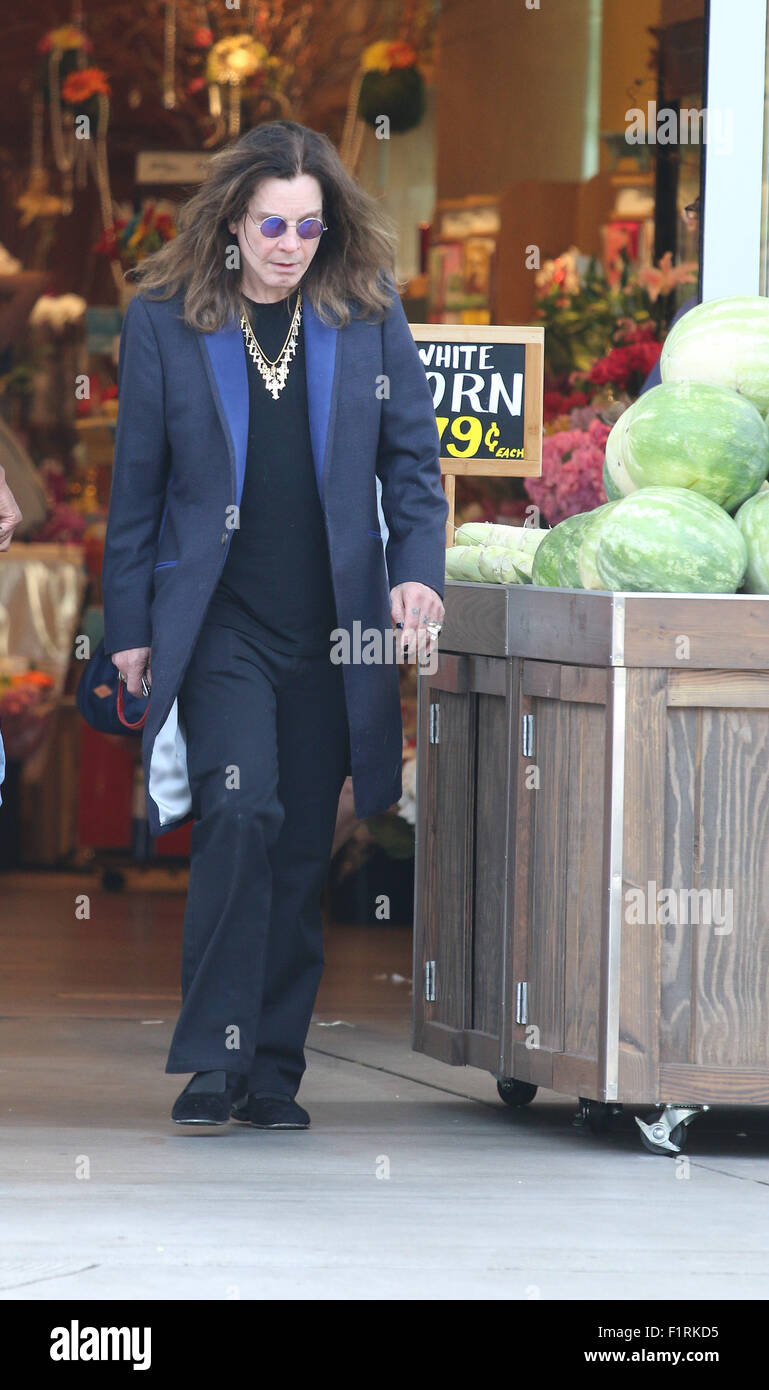 Ozzy Osbourne shopping at Bristol Farms in Beverly Hills wearing a long ...