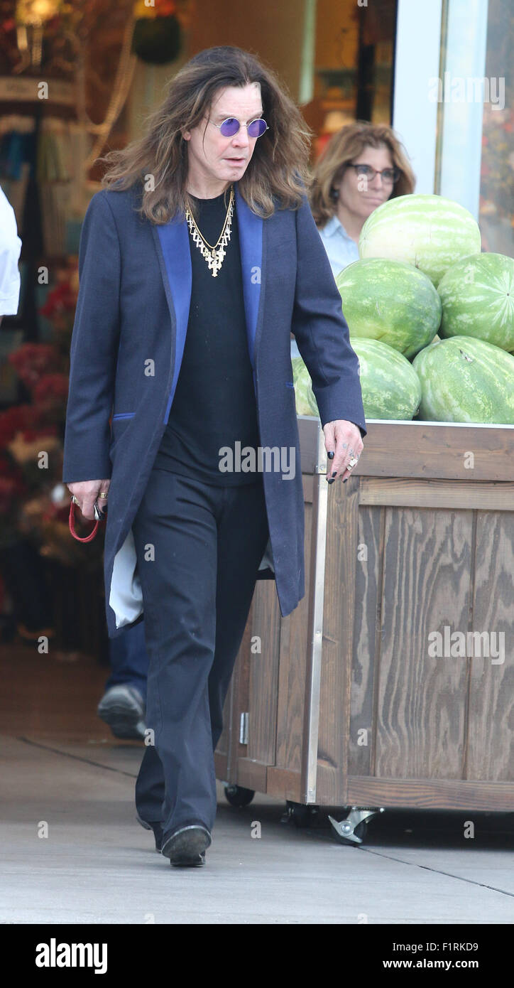 Ozzy Osbourne shopping at Bristol Farms in Beverly Hills wearing a long ...