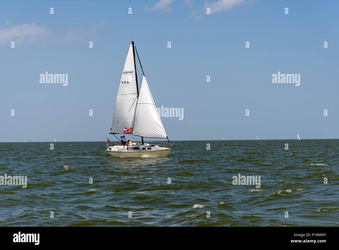 sailing a yacht in the open ocean Stock Photo - Alamy