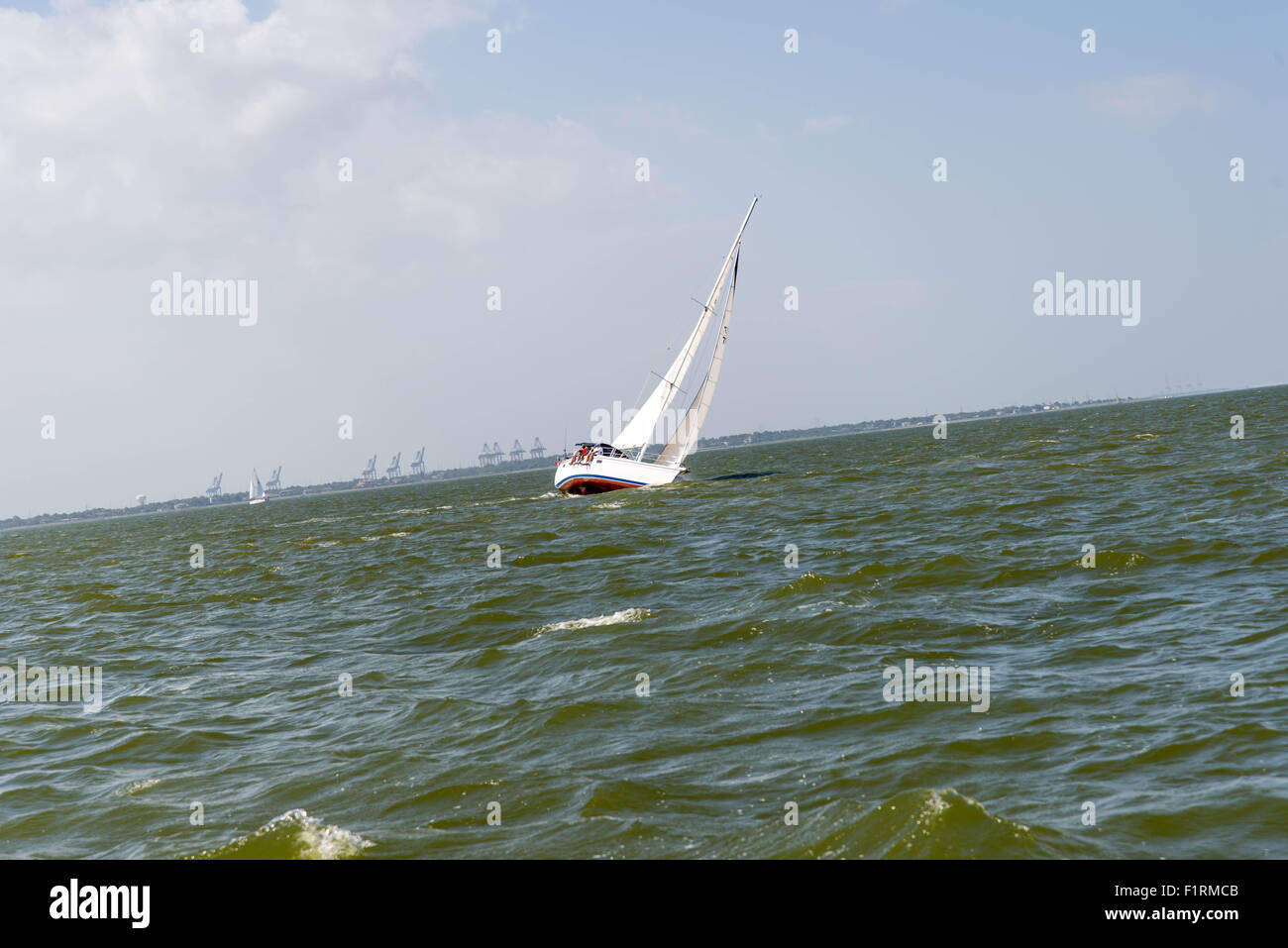sailing a yacht in the open ocean Stock Photo - Alamy
