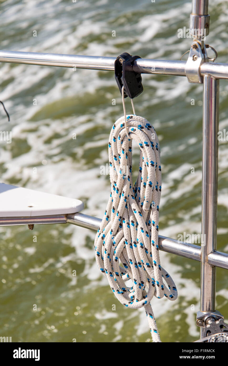 tied lines sailing a yacht in the open ocean Stock Photo - Alamy