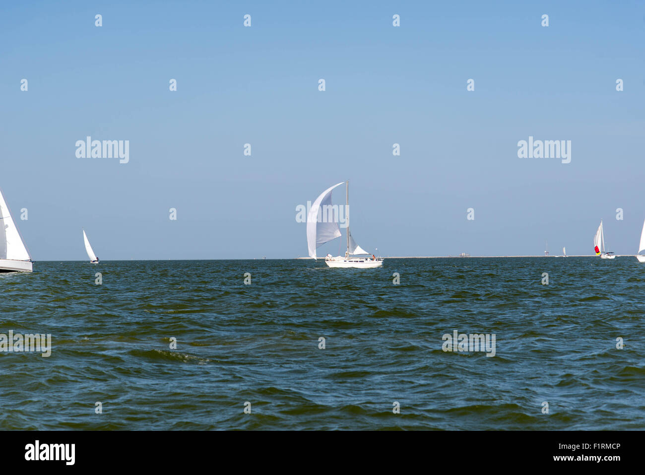 sailing a yacht in the open ocean Stock Photo - Alamy