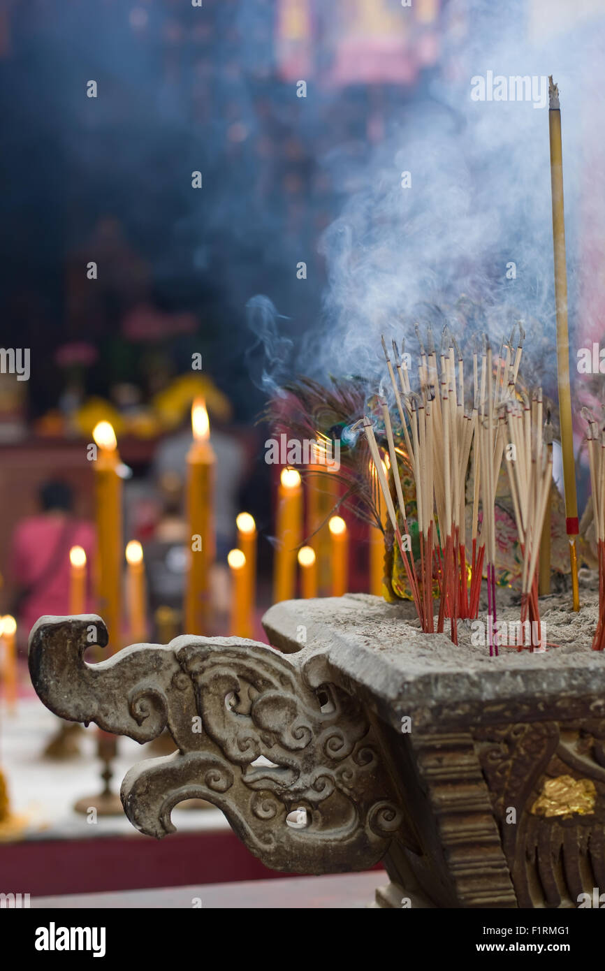 Praying joss stick hi-res stock photography and images - Alamy