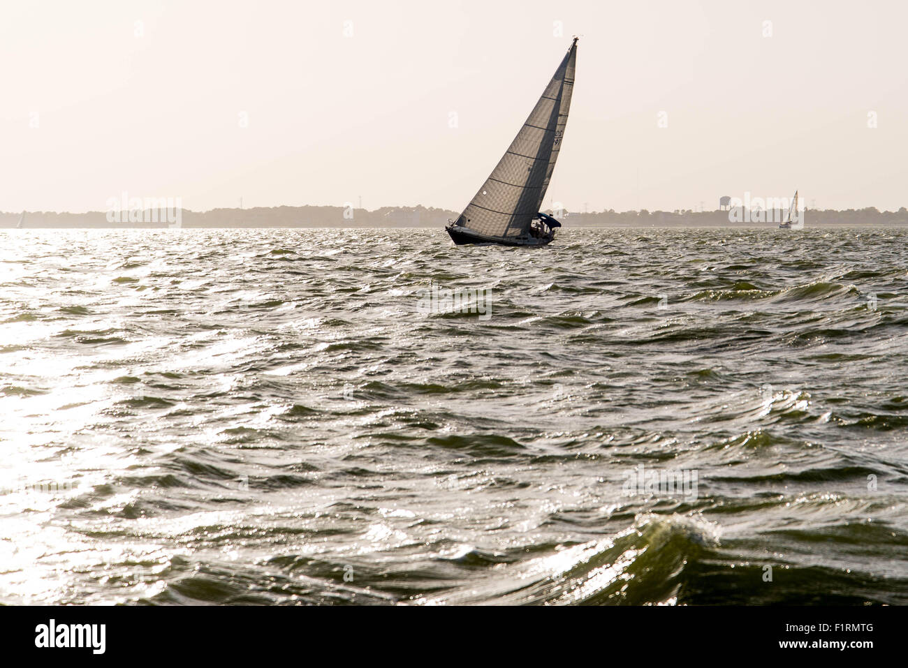 sailing a yacht in the open ocean Stock Photo - Alamy