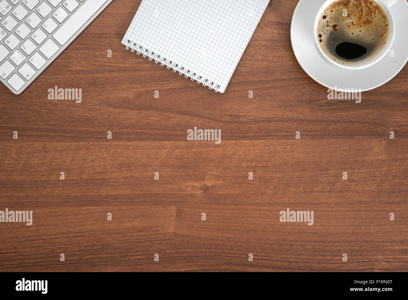 Office table with notebook, computer keyboard Stock Photo - Alamy