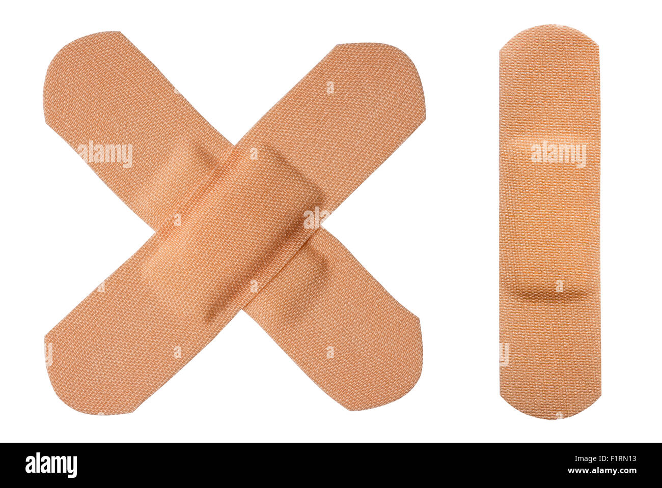 Patch in cross shape isolated on white background Stock Photo - Alamy