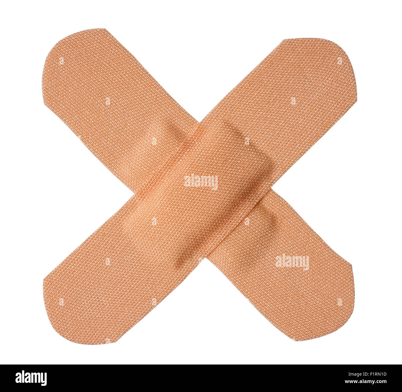 Patch in cross shape isolated on white background Stock Photo - Alamy