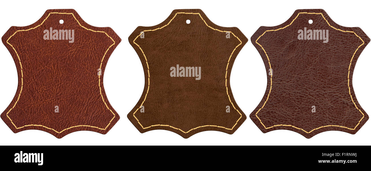 Three brown leather signs isolated on white background with clipping ...