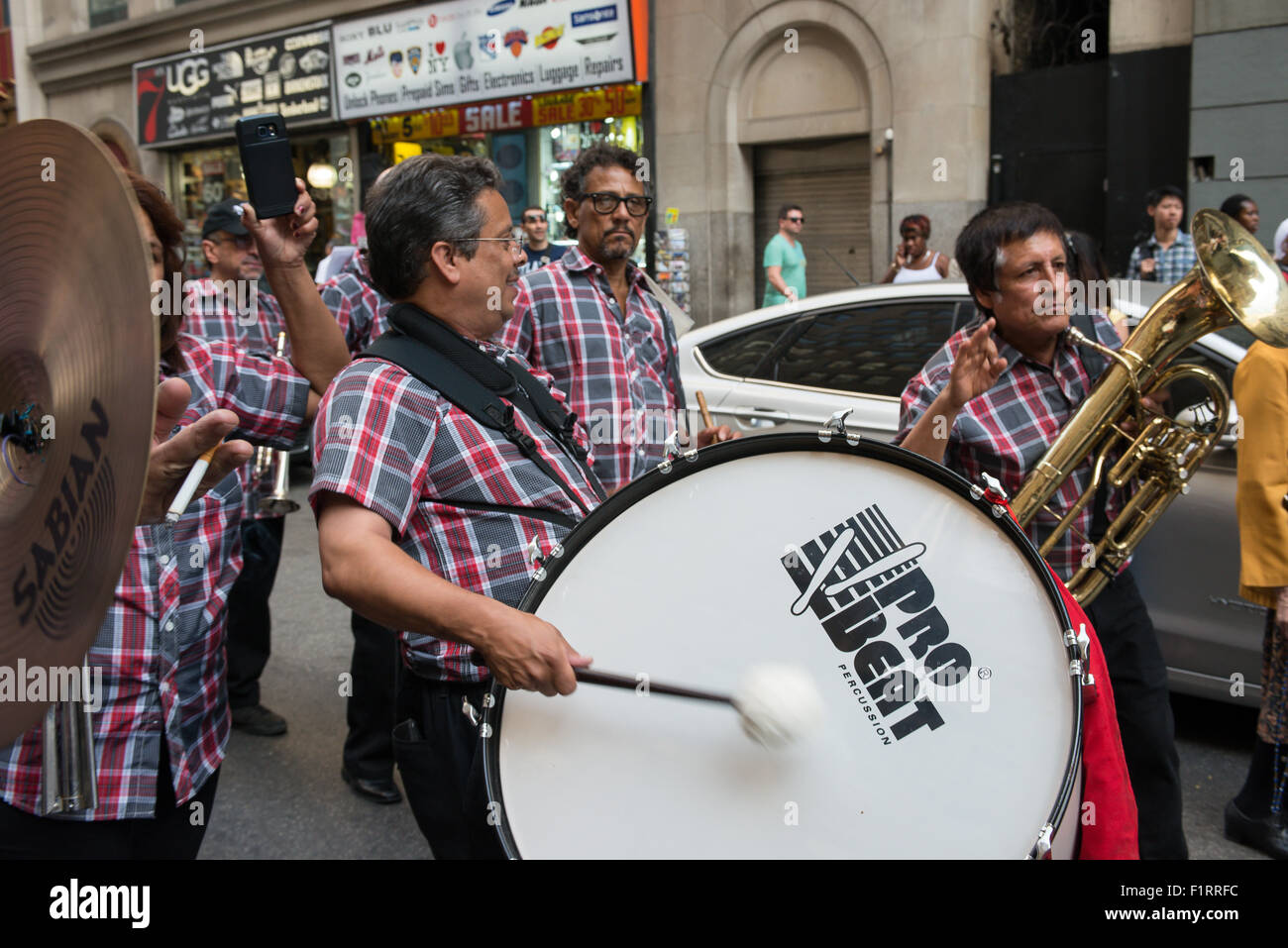 New York, United States. 06th Sep, 2015. Members of a band provide a ...